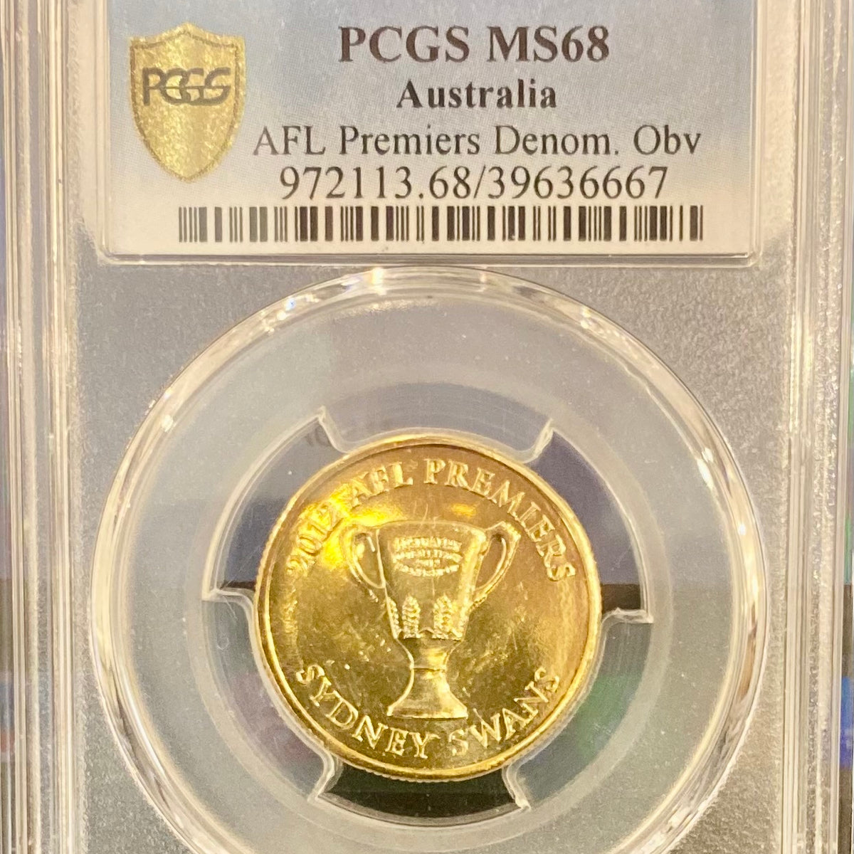 Royal Australian Mint 2012 AFL Premiers Denom Obv $1 PCGS MS68 – My Collectables